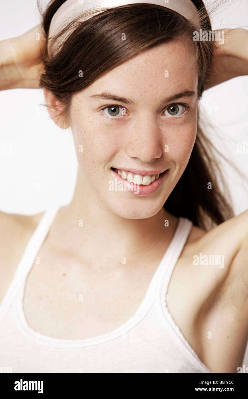 Girl, 17, wearing a singlet Stock Photo - Alamy