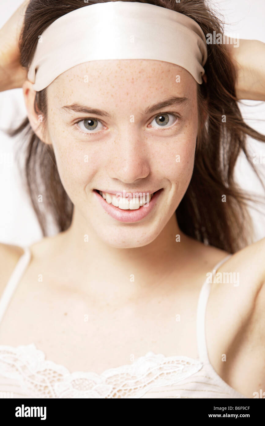 Girl, 17, wearing a singlet Stock Photo - Alamy