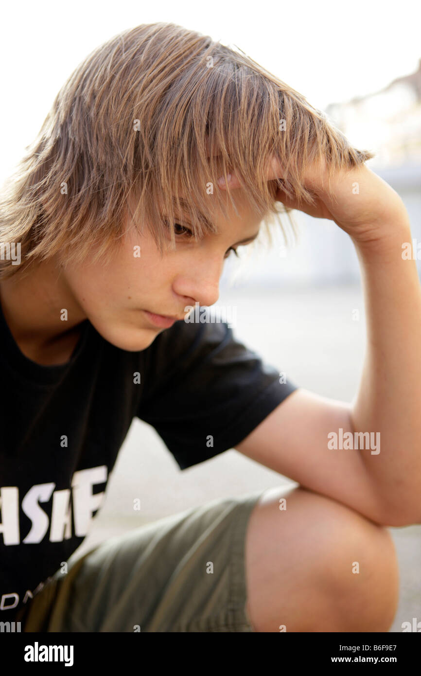 Boy, 14, contemplative Stock Photo - Alamy