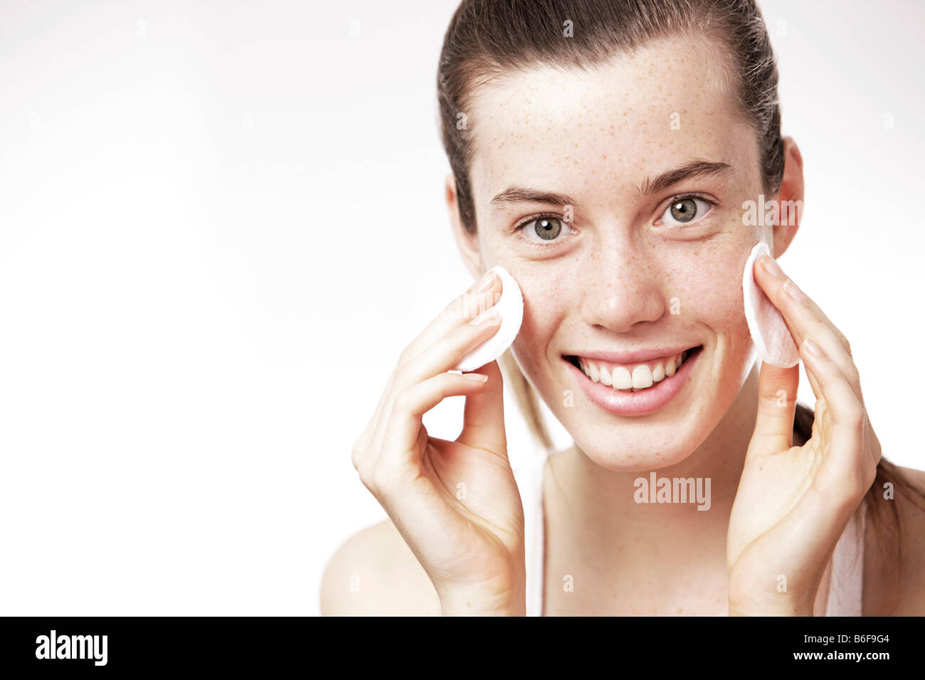 Girl with cotton pads Stock Photo - Alamy