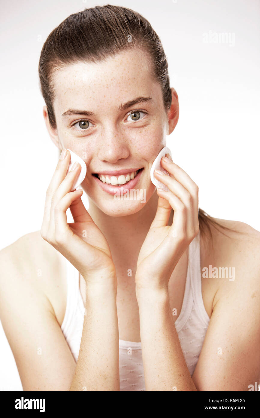 Girl with cotton pads Stock Photo - Alamy