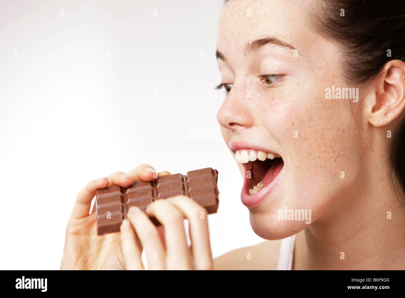 Girl with chocolate Stock Photo - Alamy