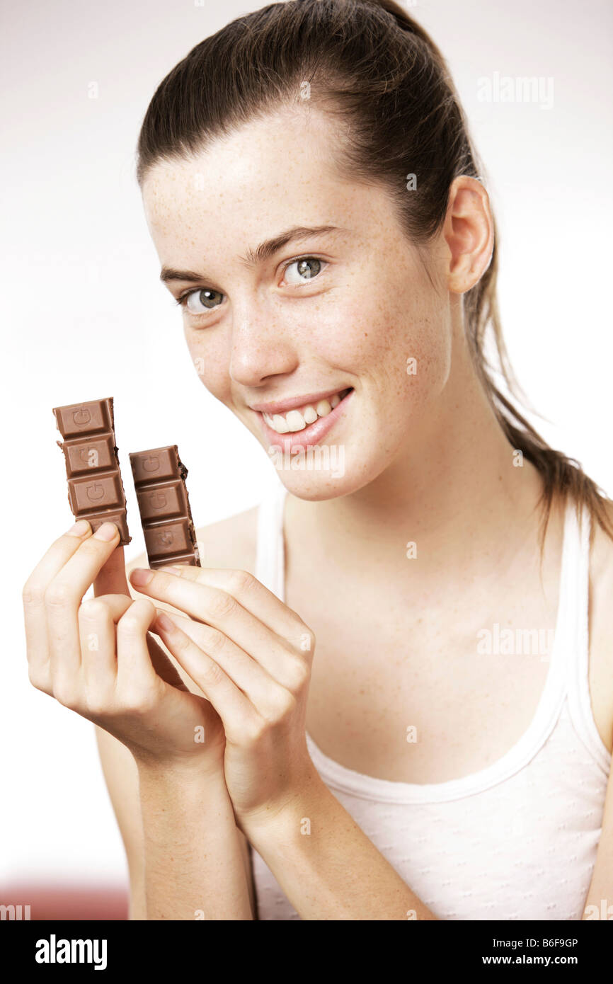 Girl with chocolate Stock Photo - Alamy