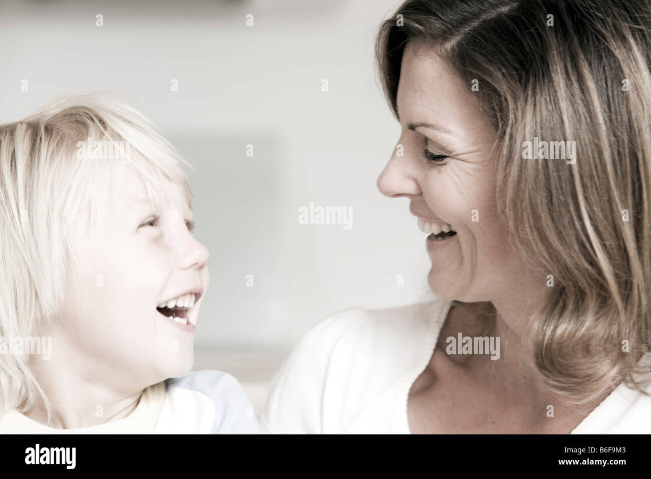 Mother and son laughing Stock Photo - Alamy