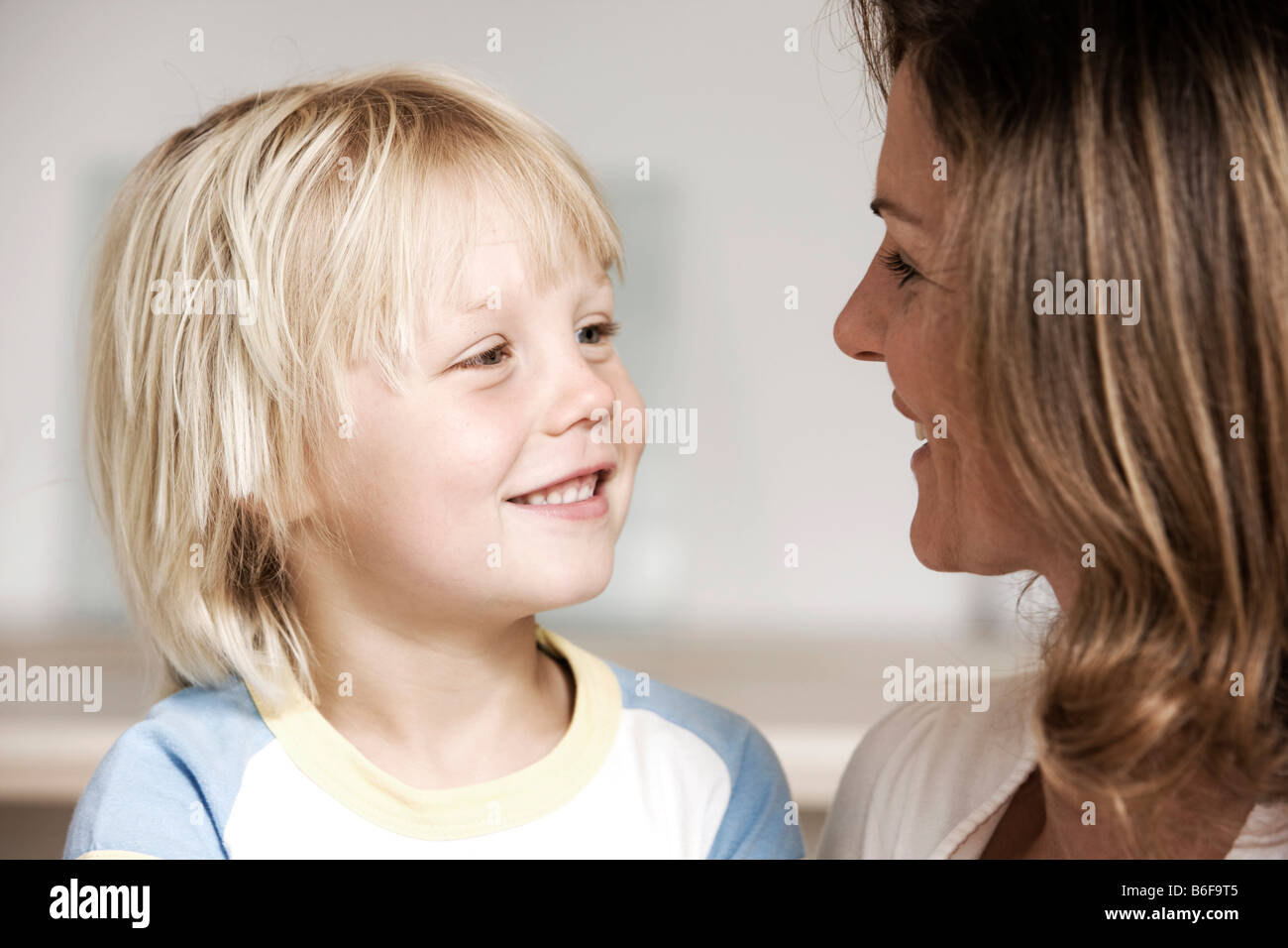 Mother son smiling other face hi-res stock photography and images - Alamy