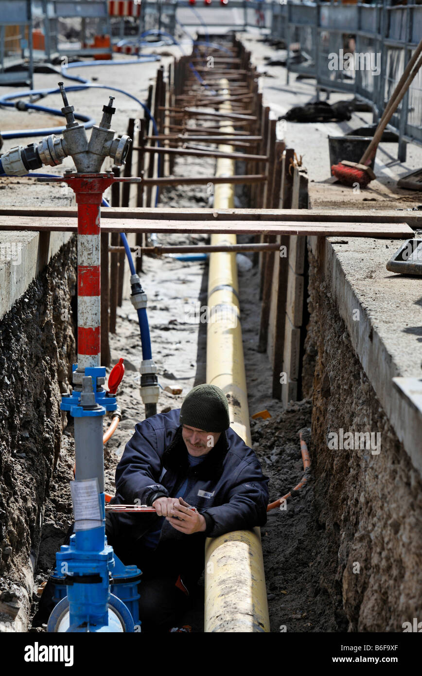 Water pipes man worker works hi-res stock photography and images - Alamy