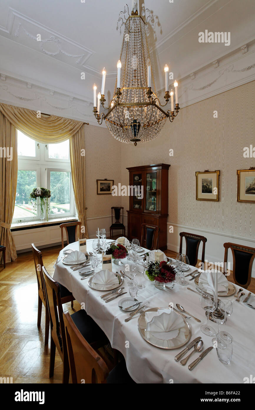 Biedermeierzimmer or Biedermeier Room with crystal chandelier over a ...