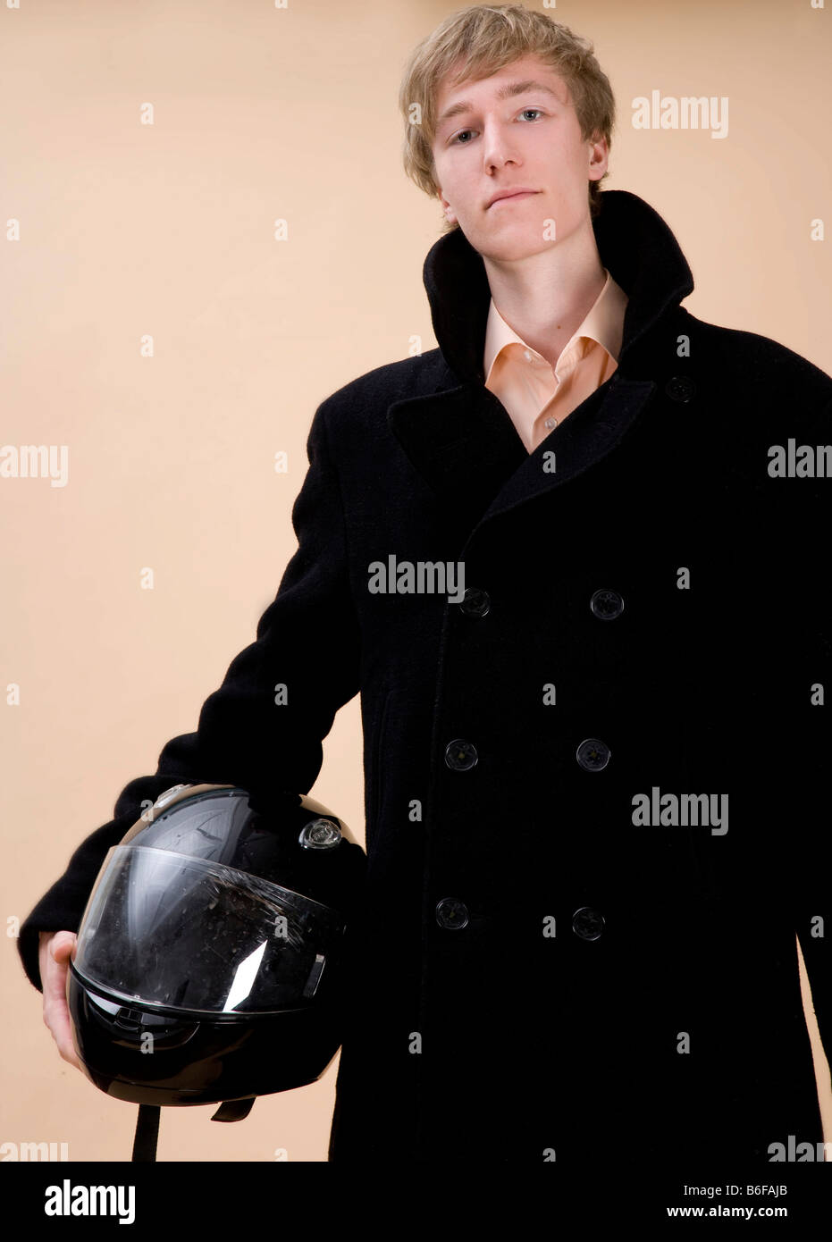 Young man with a helmet Stock Photo - Alamy