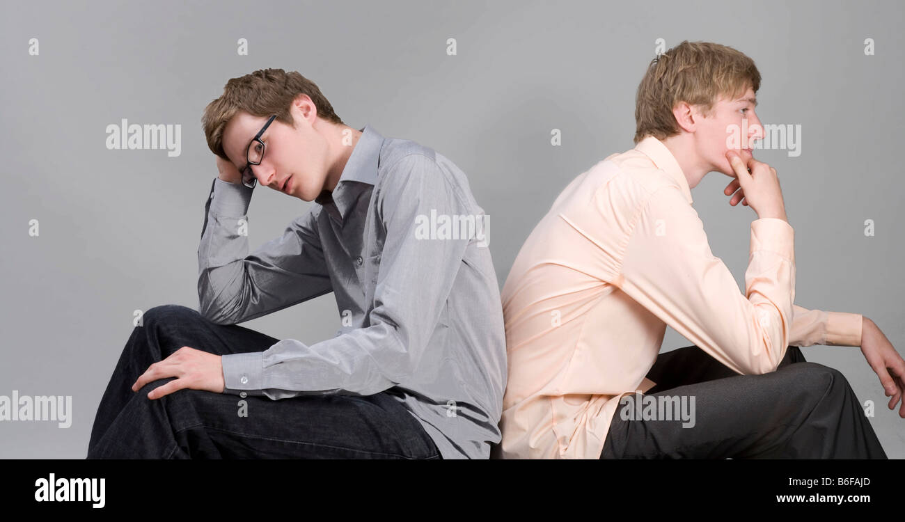 Two boys thinking Stock Photo - Alamy