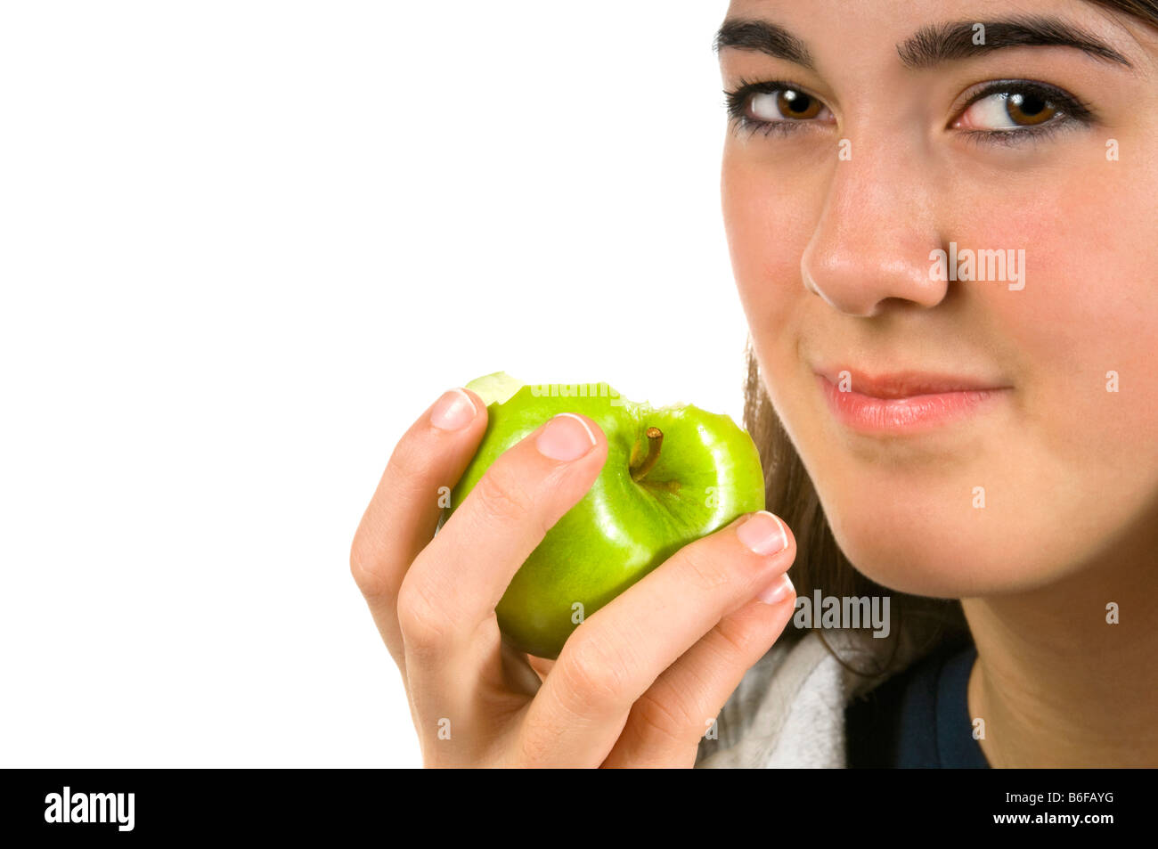 Woman young biting apple profile hi-res stock photography and images ...