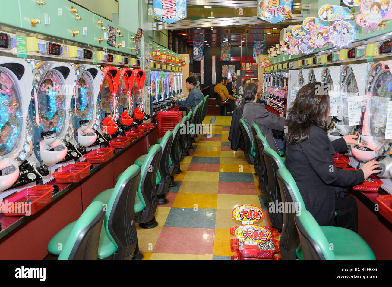 Japanese gambling on flipper game machines in a flipper gaming hall ...