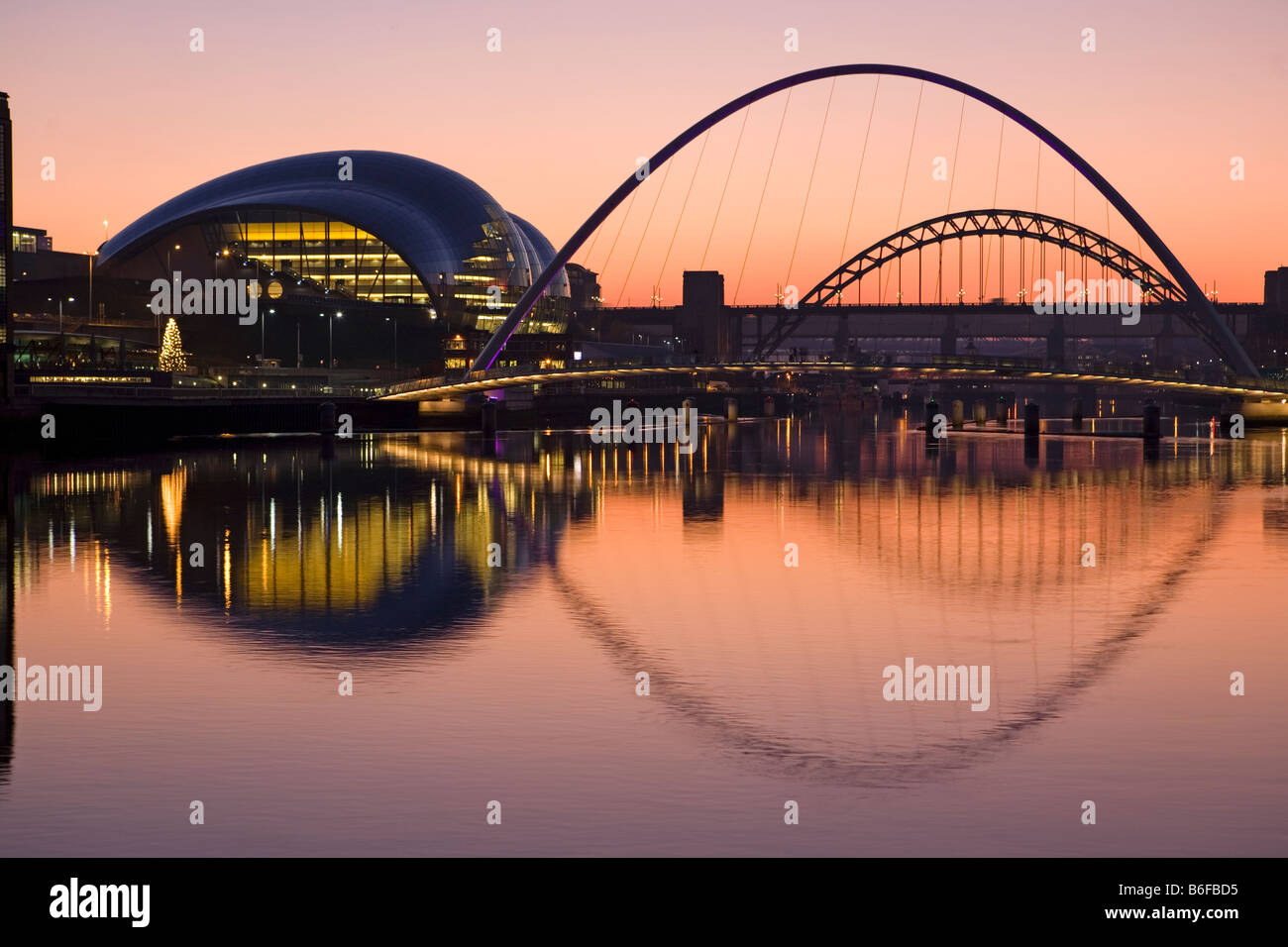 The Sage Gateshead and famous Tyne Bridges reflected in the River Tyne ...
