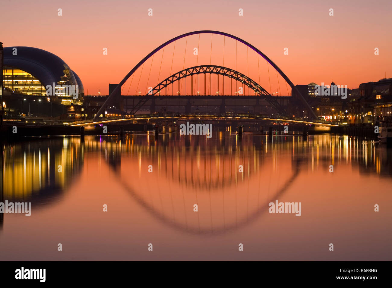 The Sage Gateshead and famous Tyne Bridges reflected in the River Tyne ...