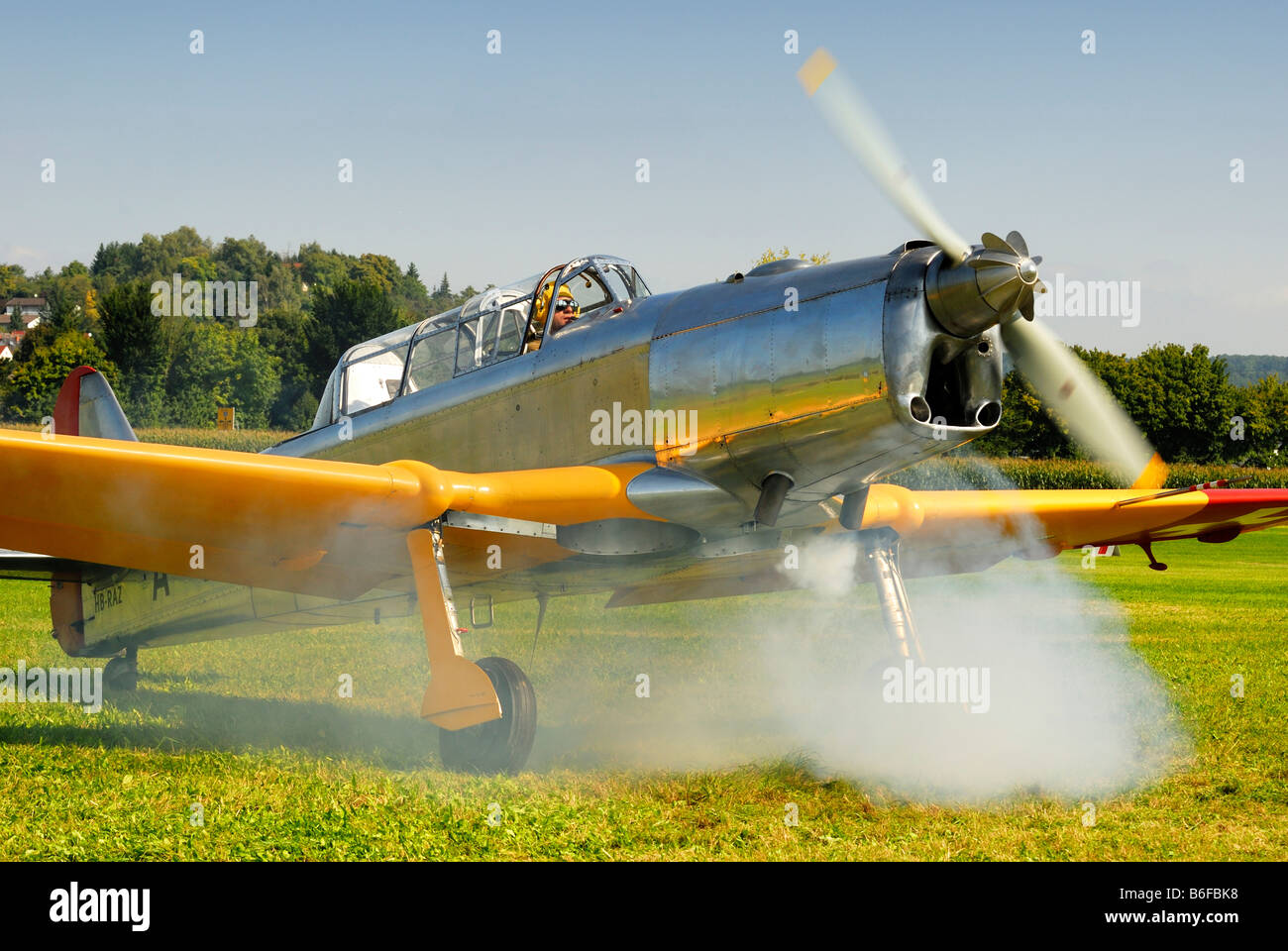 Historic Swiss military aircraft, Pilatus P-2, starting its engine ...