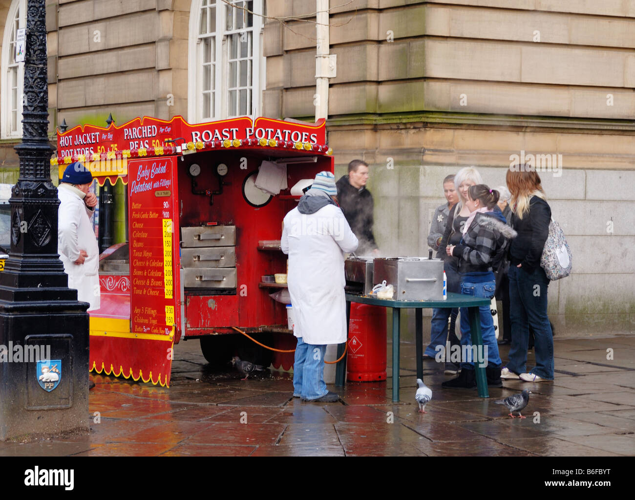 Roast potato vendor in Preston city centre Stock Photo - Alamy