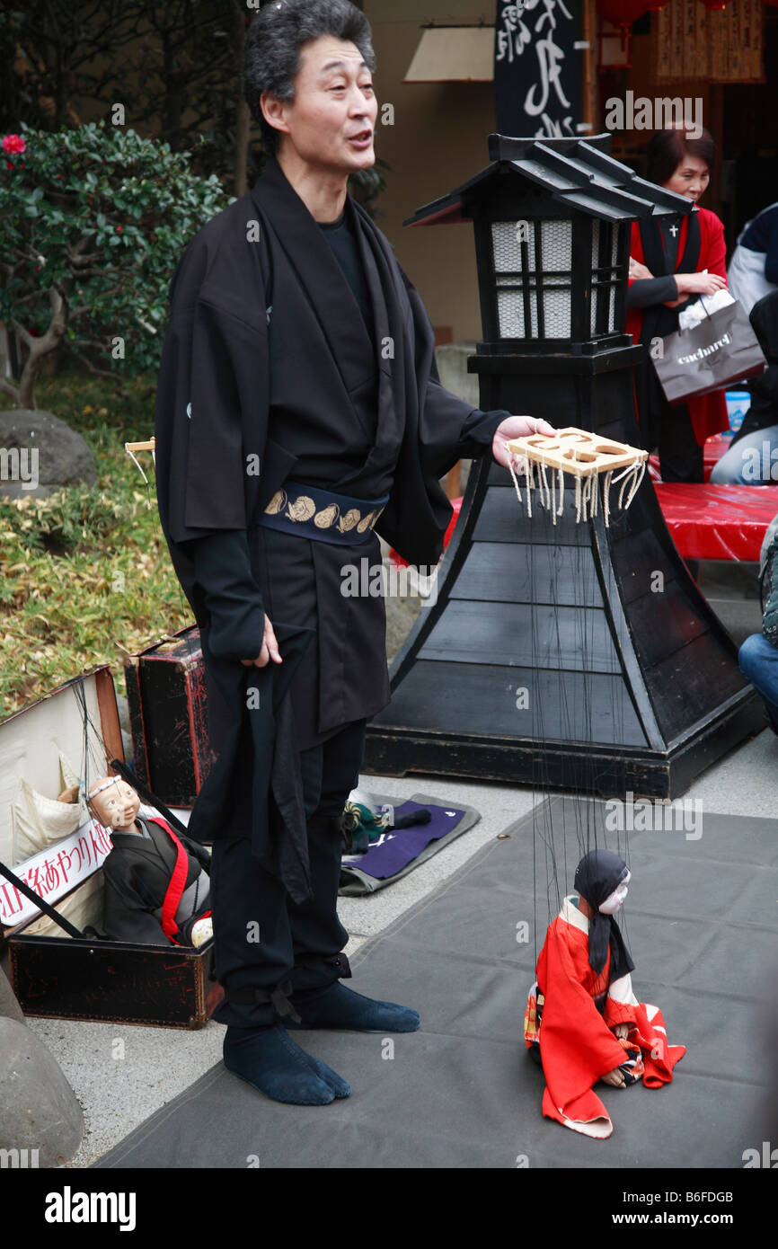 Japan Tokyo Asakusa street puppet show Stock Photo - Alamy
