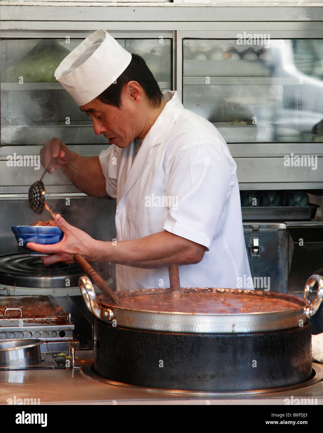 Japan Tokyo Tsukiji Fish Market restaurant cook Stock Photo - Alamy