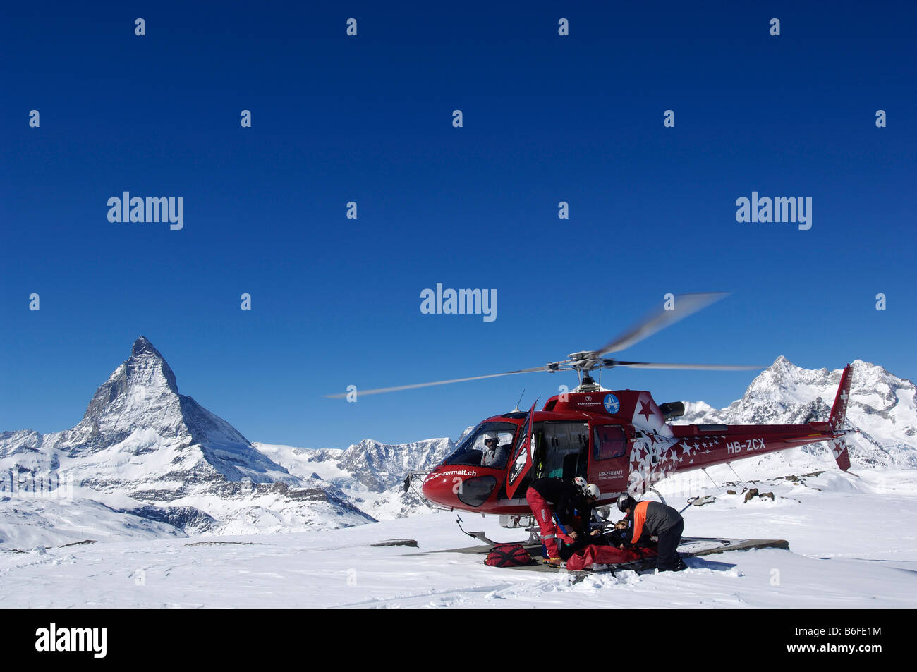 Air Zermatt, rescue helicopter during a rescue, Matterhorn Mountain ...