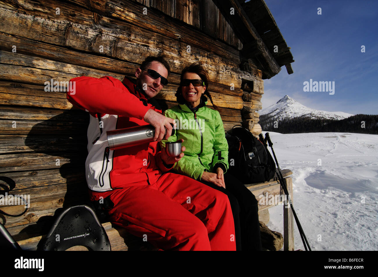 Snowshoe hikers on the Alpe Nemes Alps in the High Puster Valley or ...