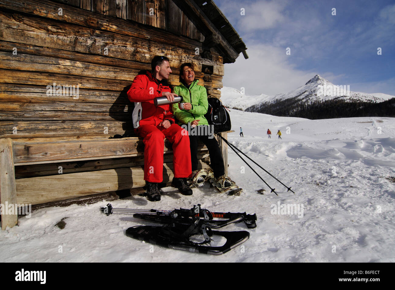 Snowshoe hikers on the Alpe Nemes Alps in the High Puster Valley or ...