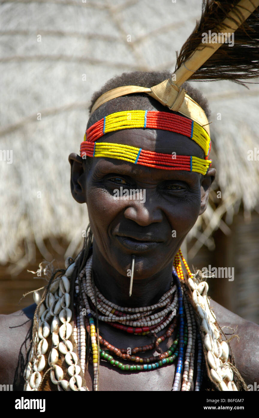 Karo men wearing traditional decorations hi-res stock photography and ...