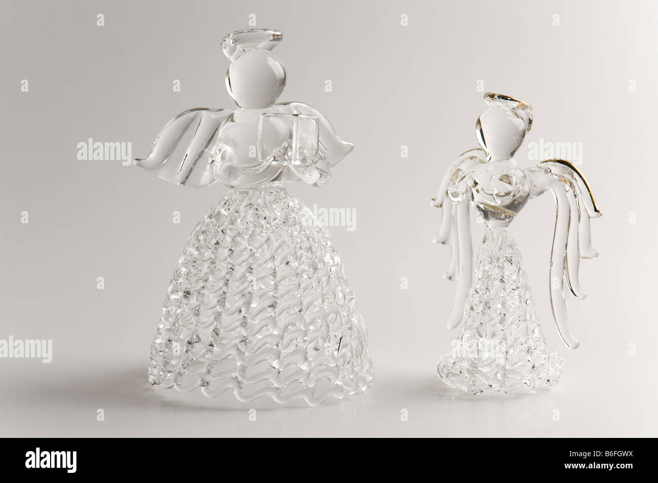 A pair of hand-made glass angels Stock Photo - Alamy