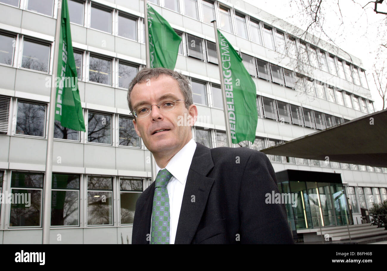 Bernd Scheifele, chief executive of the HeidelbergCement AG, in front ...