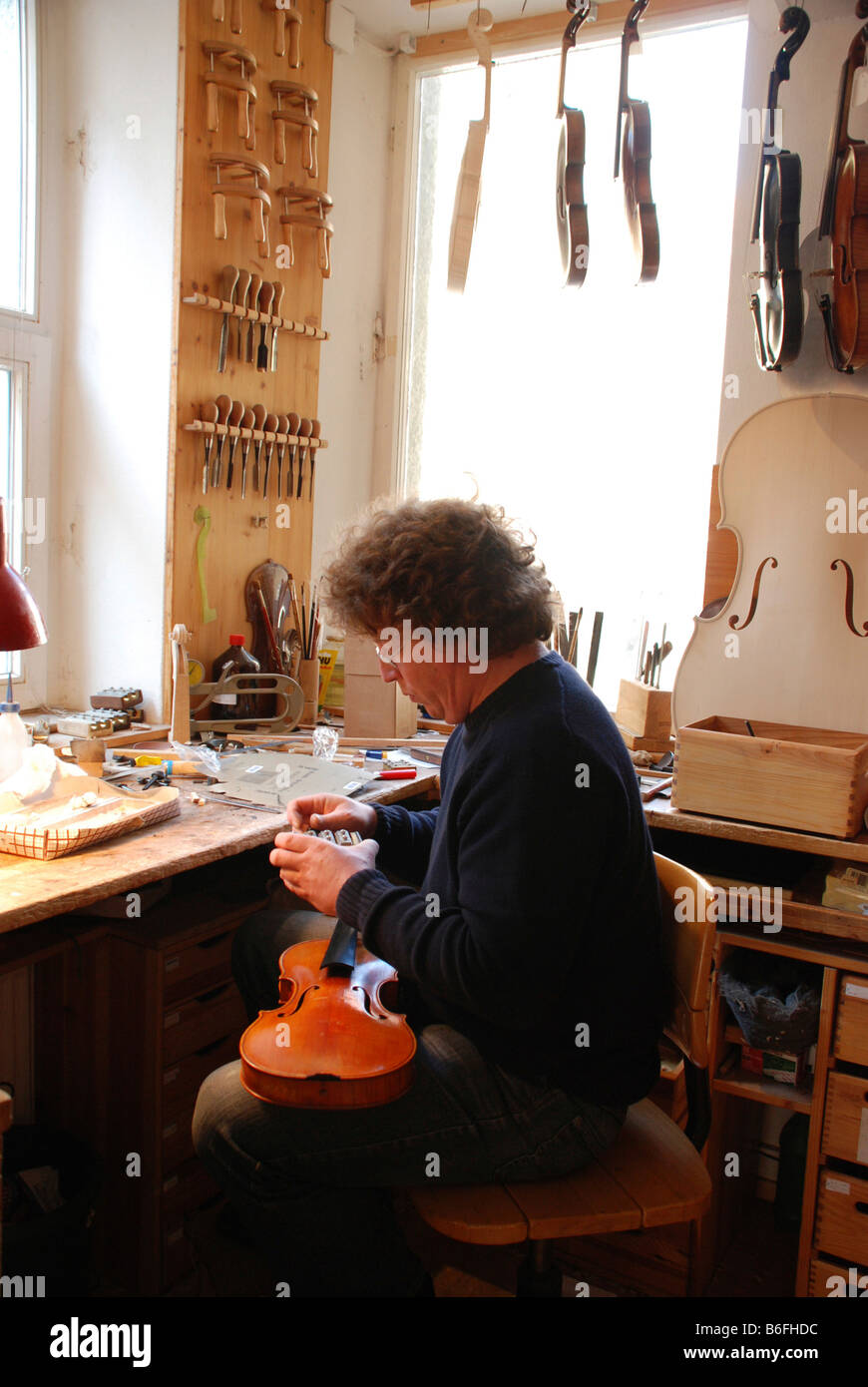 Musical instruments maker hi-res stock photography and images - Alamy