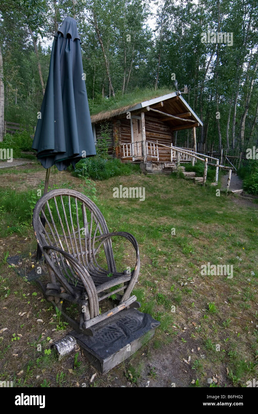 Wooden armchair, historic Robert Service Cabin, famous Canadian writer ...