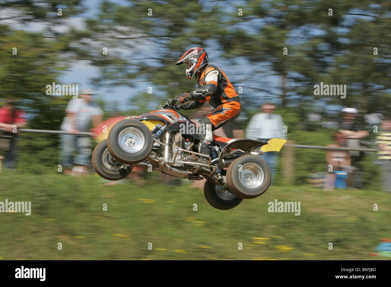 All-terrain vehicle or Quad jumping at a Supermoto race Stock Photo - Alamy
