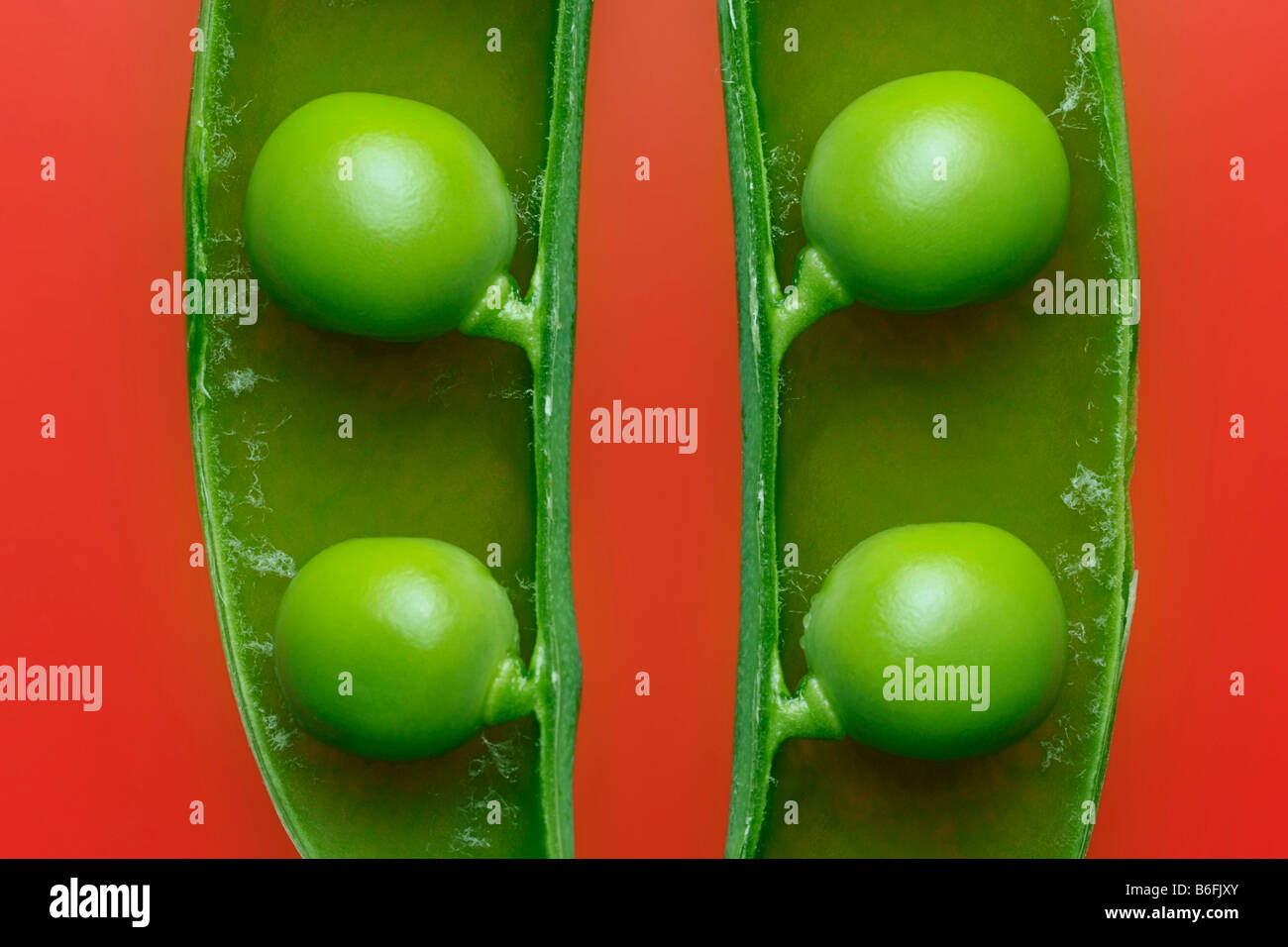 Peas in a pod, detail Stock Photo - Alamy