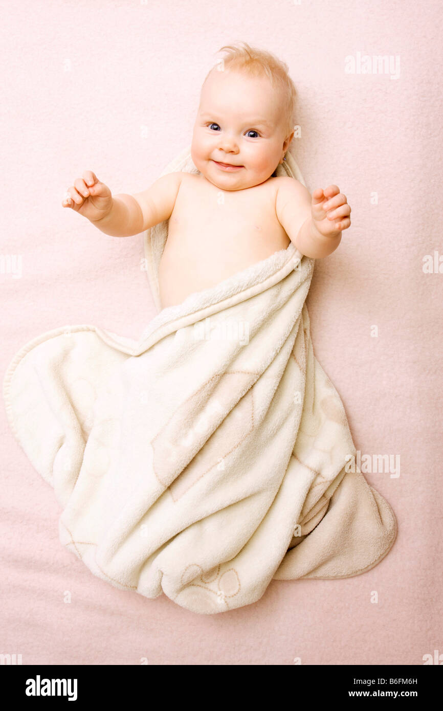 Baby wrapped in blankets hi-res stock photography and images - Alamy