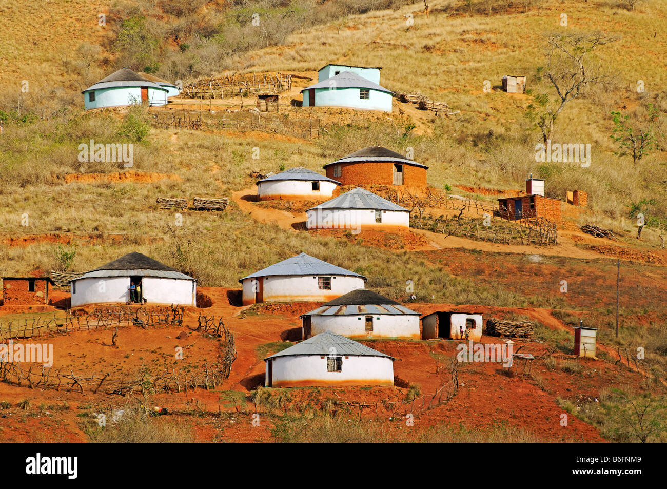 Traditional round huts or rondavels of the Zulu people in in Lalani ...