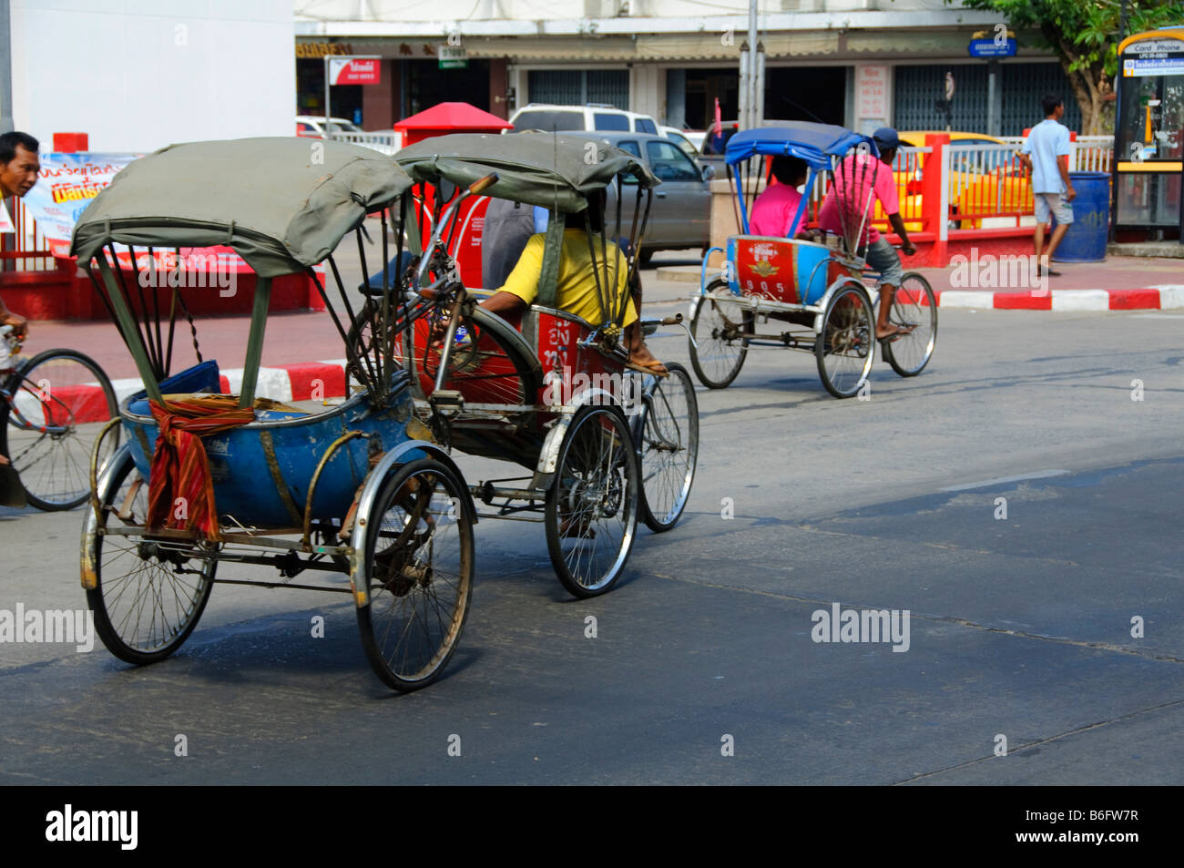 rickshaw pulling rickshaw in Surin Thailand Stock Photo - Alamy