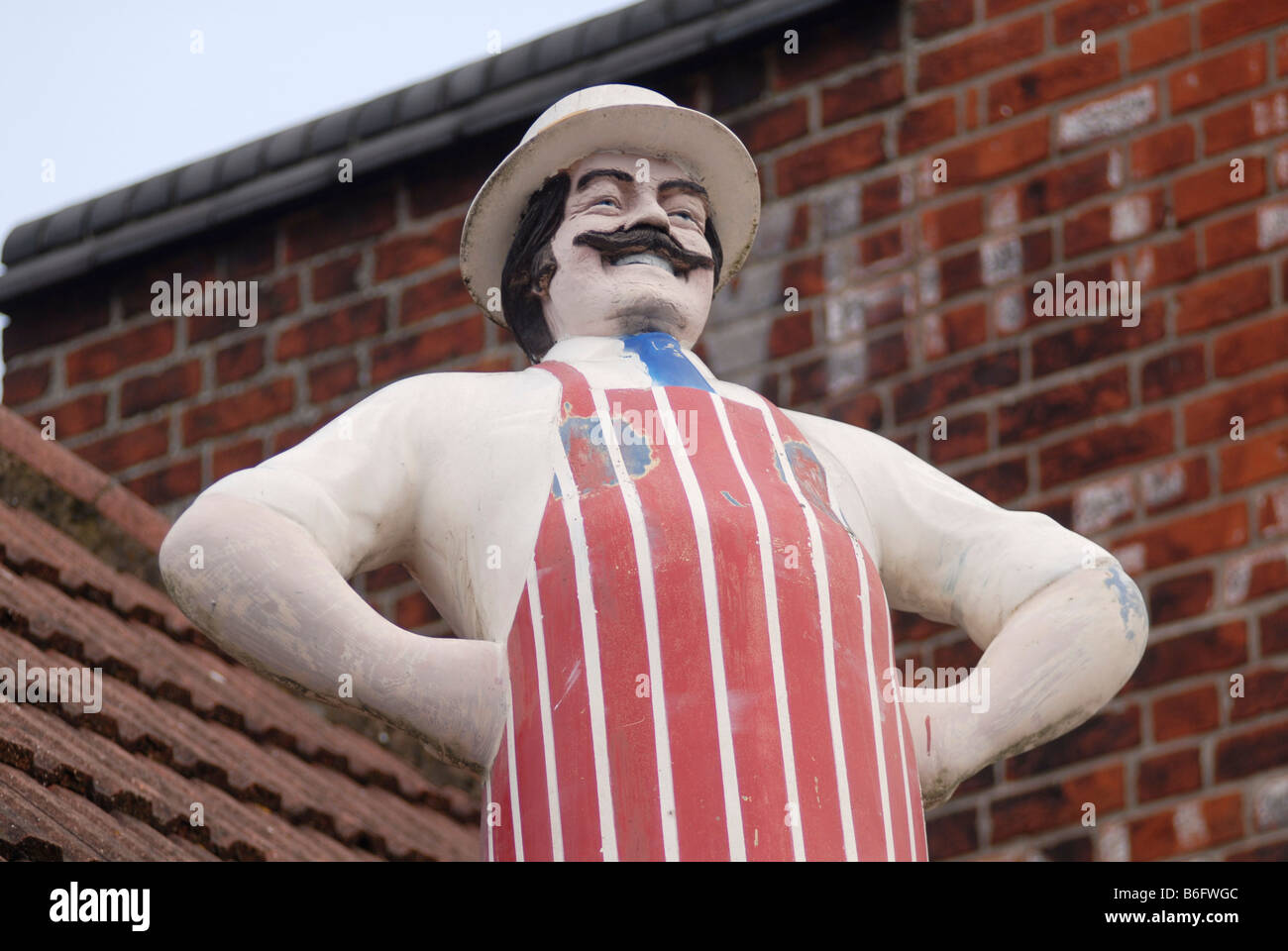 Model of a butcher outside a butchers shop in Bedford UK 2008 Stock ...