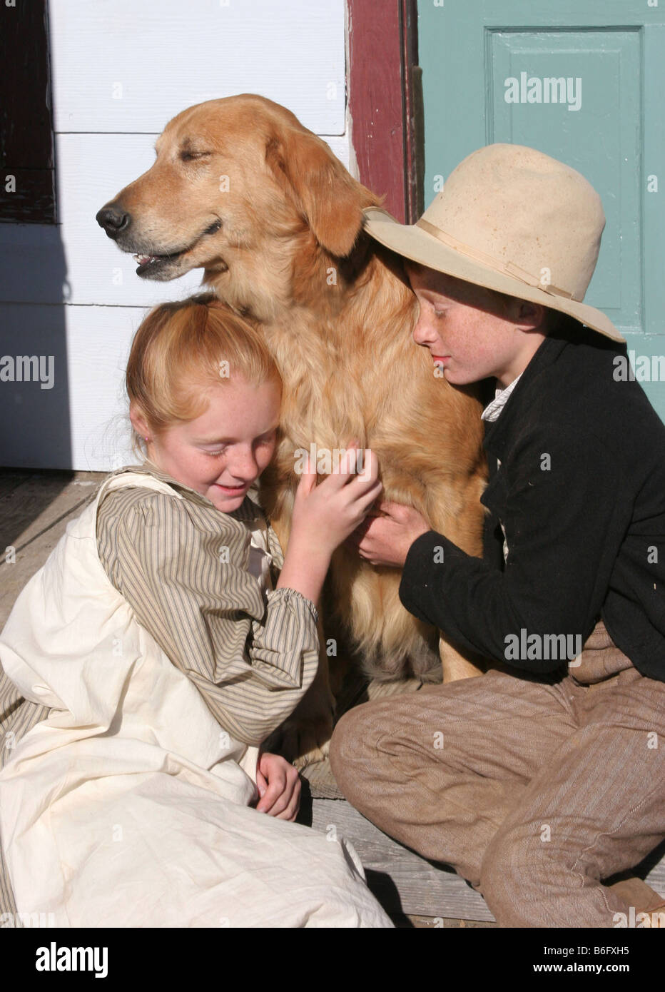 children hugging a dog Stock Photo - Alamy