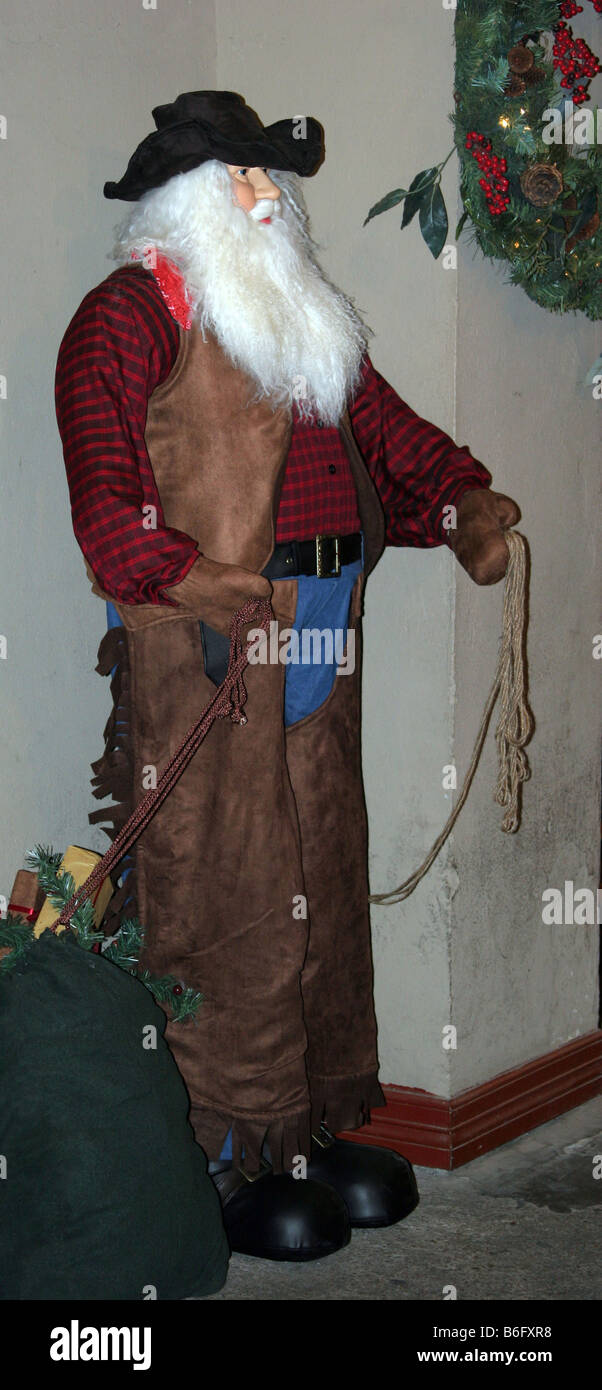 A Western Santa on display at a store in Texas Stock Photo - Alamy