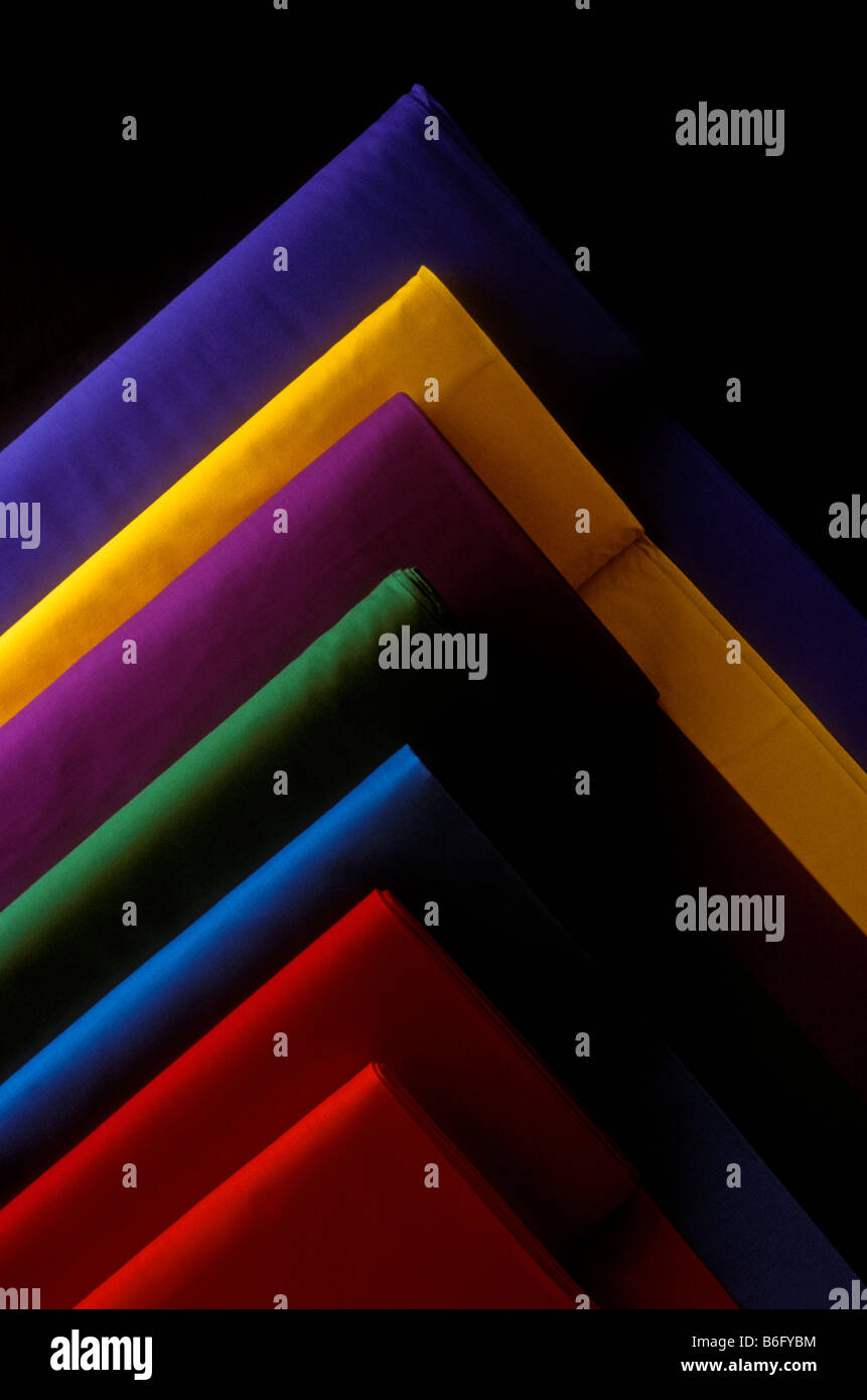 multi colored fabric bolts samples still life Stock Photo - Alamy
