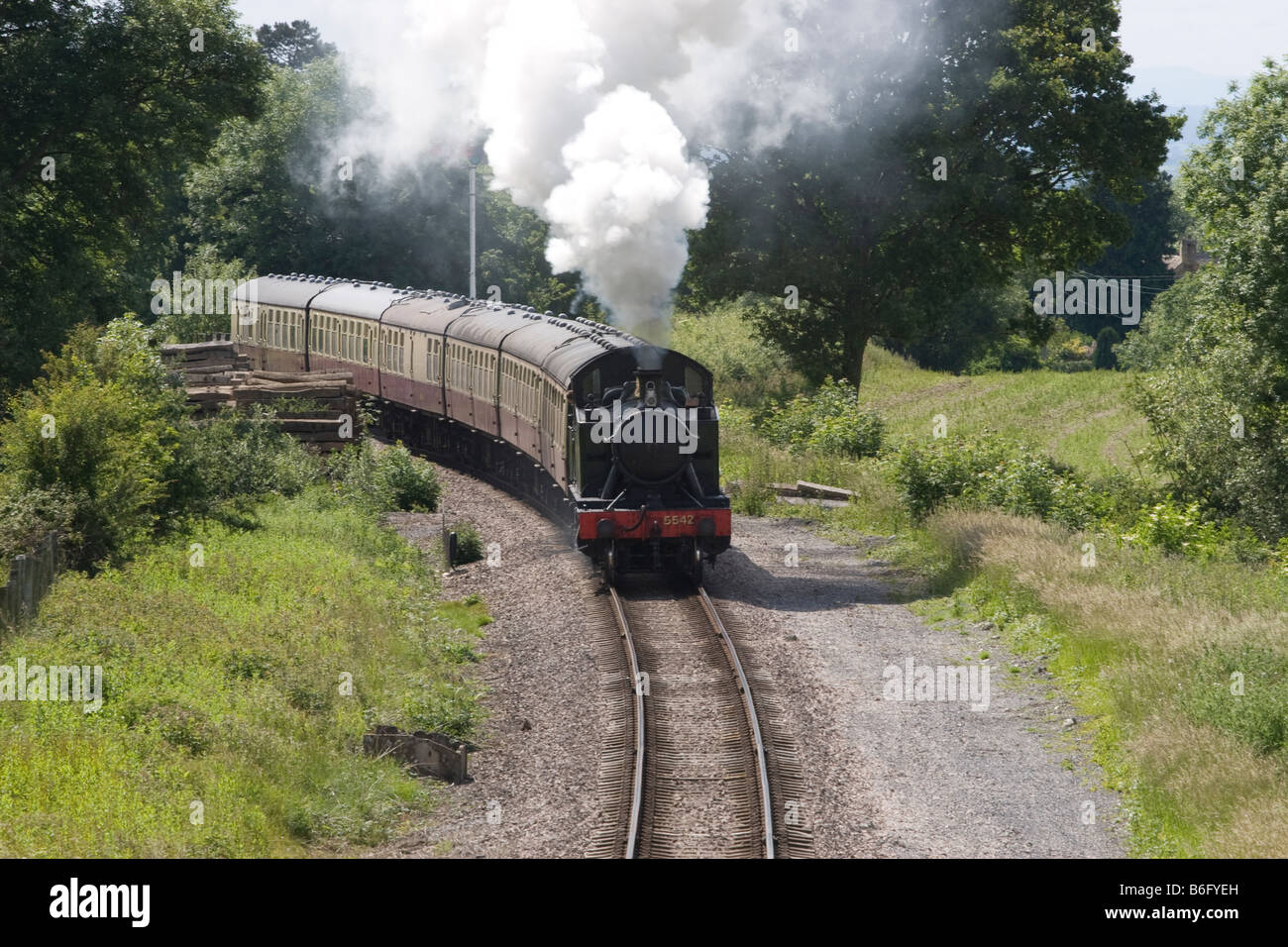 Steam Locomotive Steams through Countryside Stock Photo - Alamy