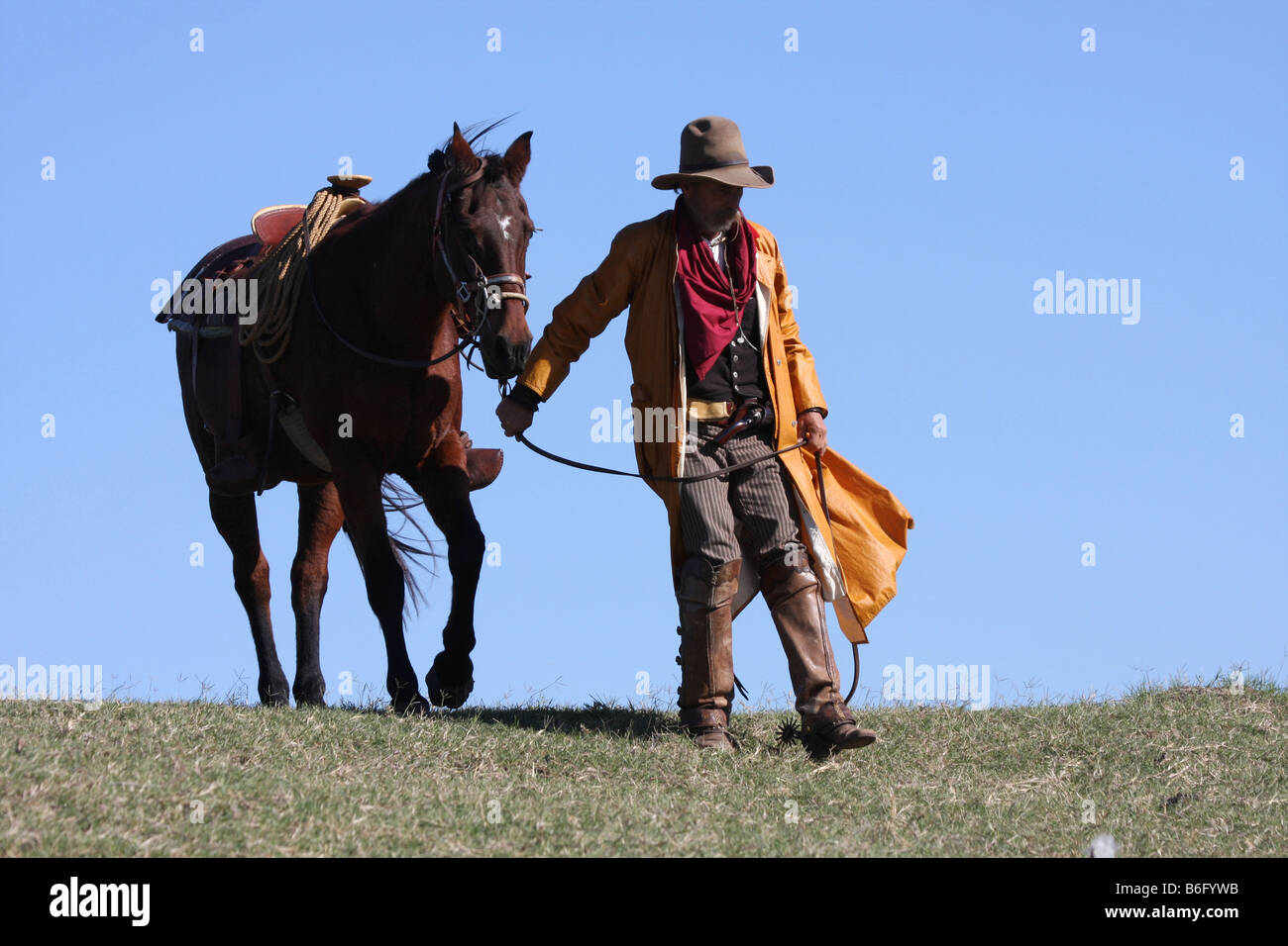 Cowboy walking hi-res stock photography and images - Alamy