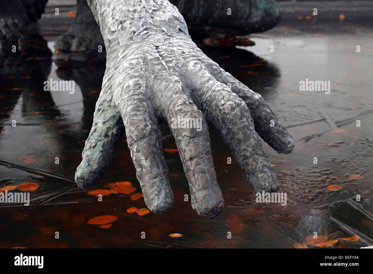 A hand on the statue in the Garden of Remembance in Dublin, dedicated ...