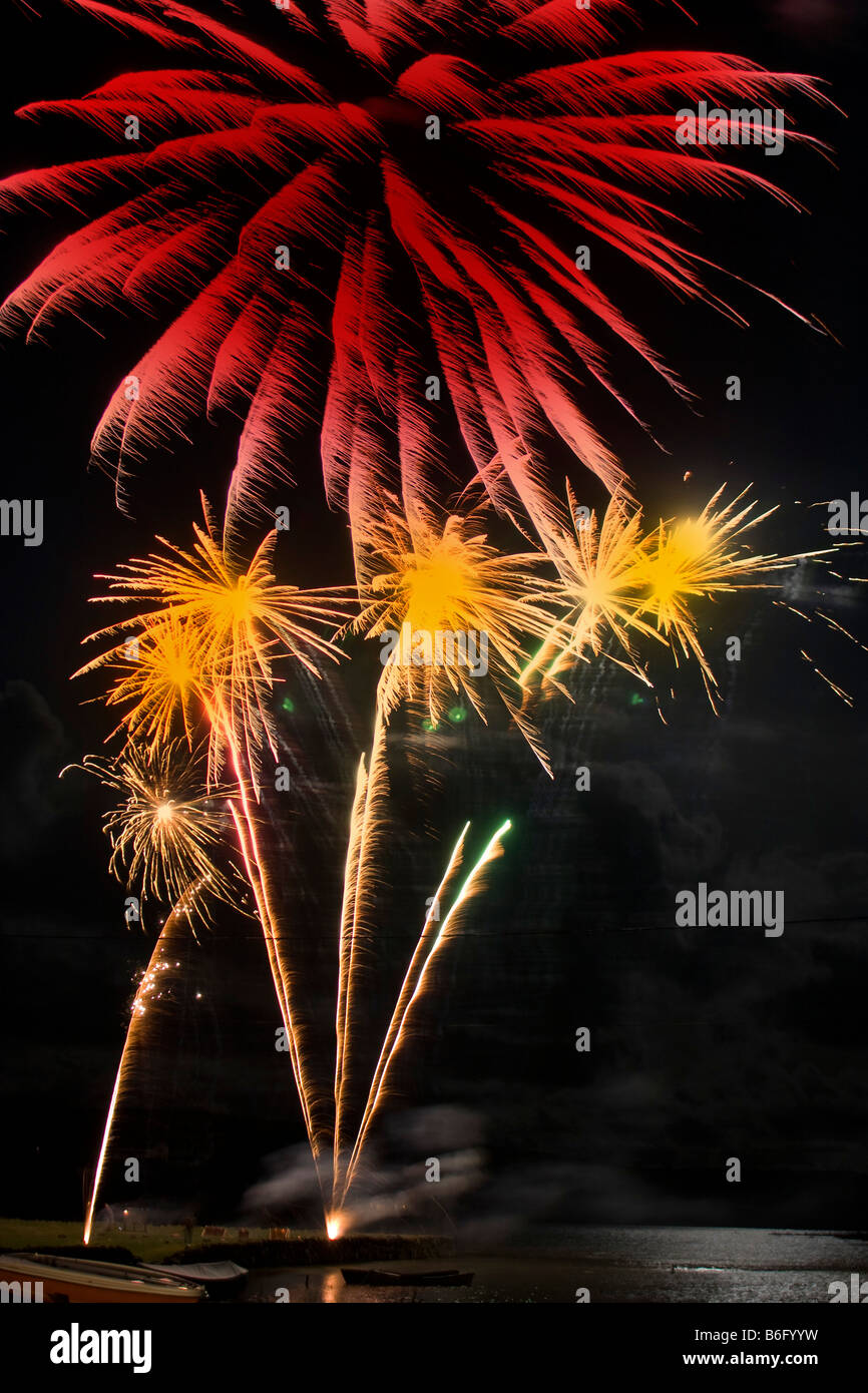 Firework display light show rocket explosion spread in black sky Full ...