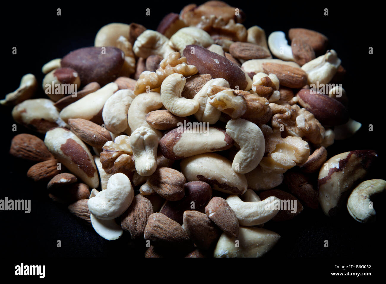 A selection of mixed nuts Stock Photo - Alamy