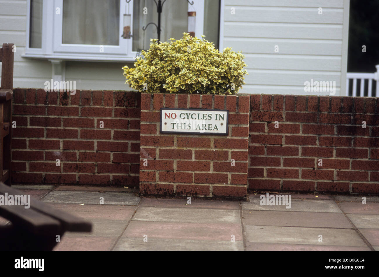 Apparently unnecessary 'no cycles' sign in UK campsite Stock Photo - Alamy