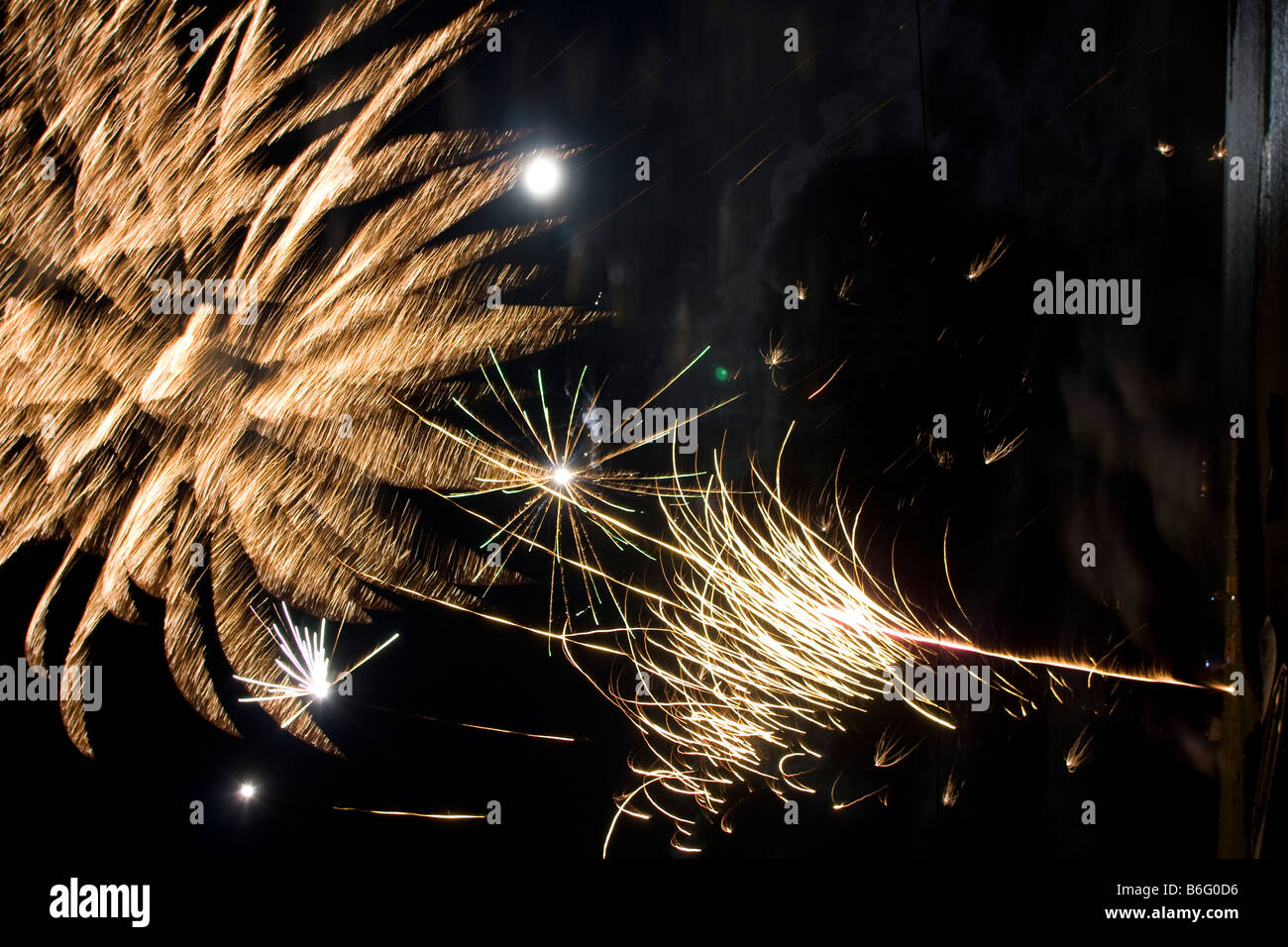 Firework display light show rocket explosion spread in black sky Full ...