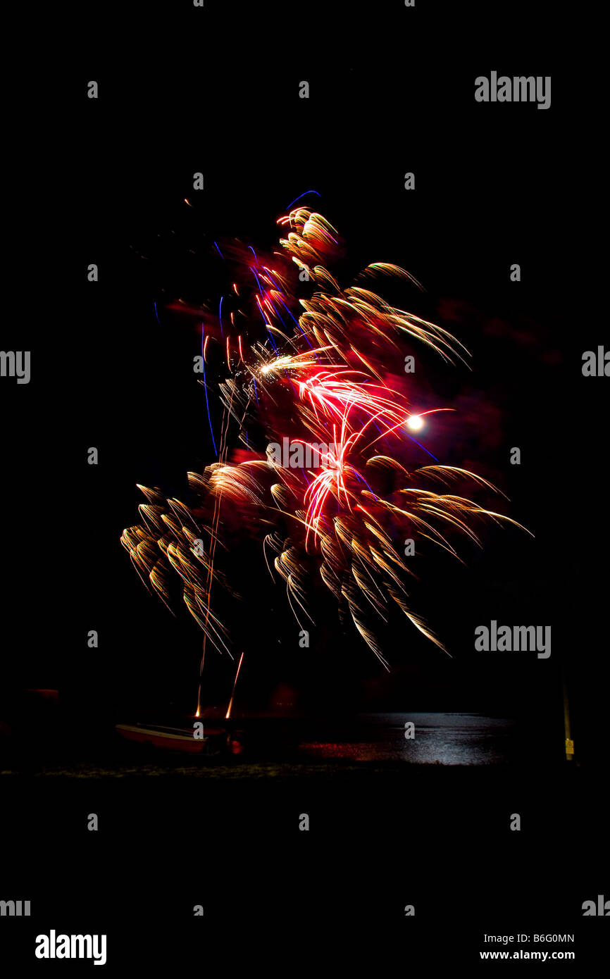 Firework display light show rocket explosion spread in black sky Full ...