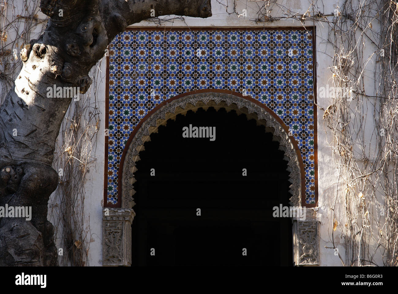 tiled door entrance in a spanish garden Stock Photo - Alamy