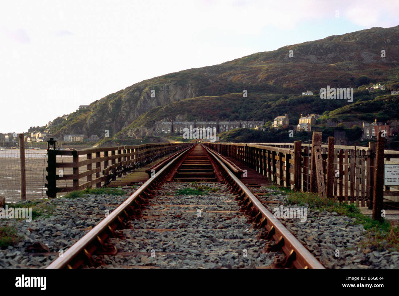 Train tracks across Barmouth Toll bridge, Wales Stock Photo - Alamy