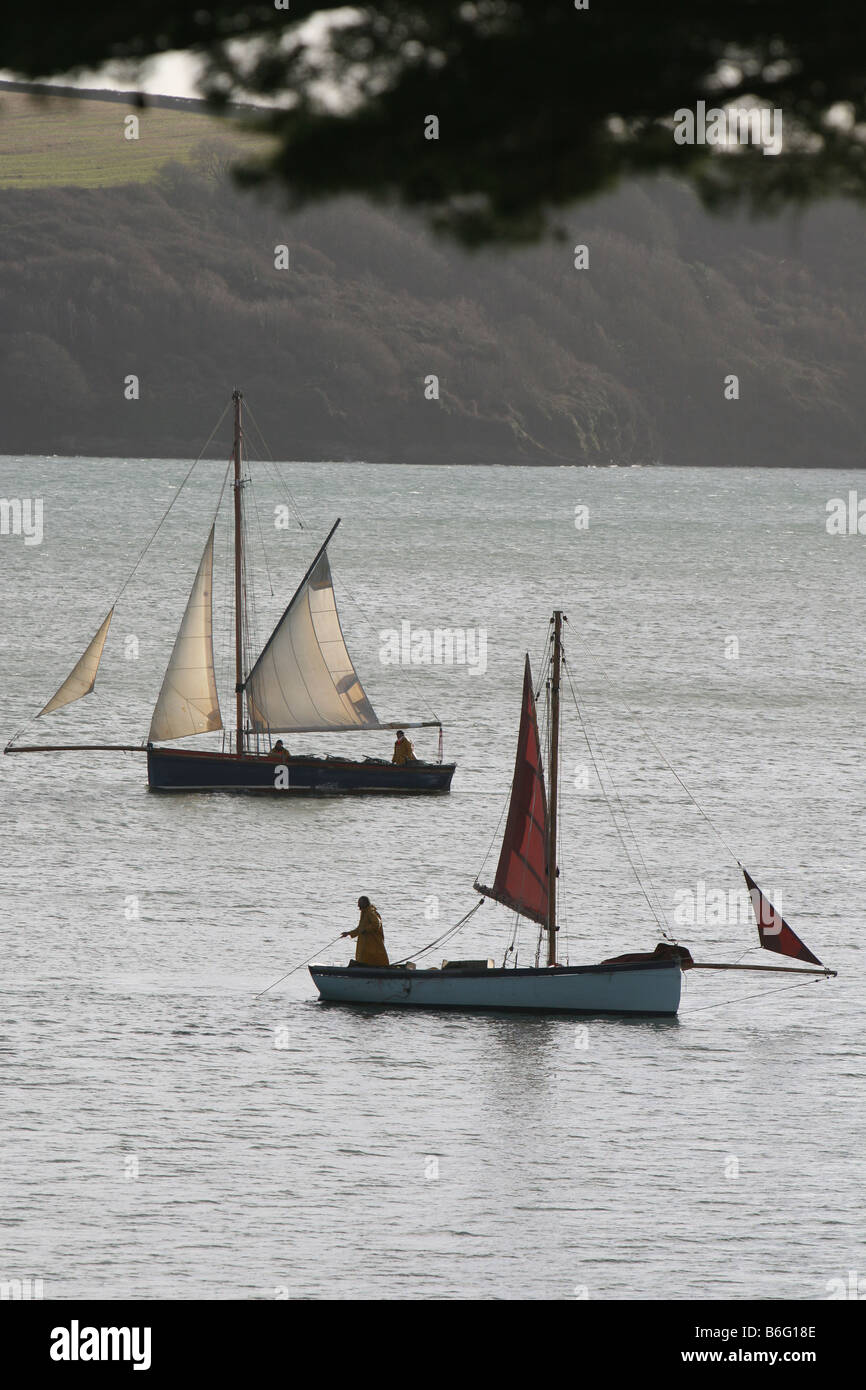 Oyster fishermen off Loe Beach Carrick Roads Feock Cornwall in Winter ...