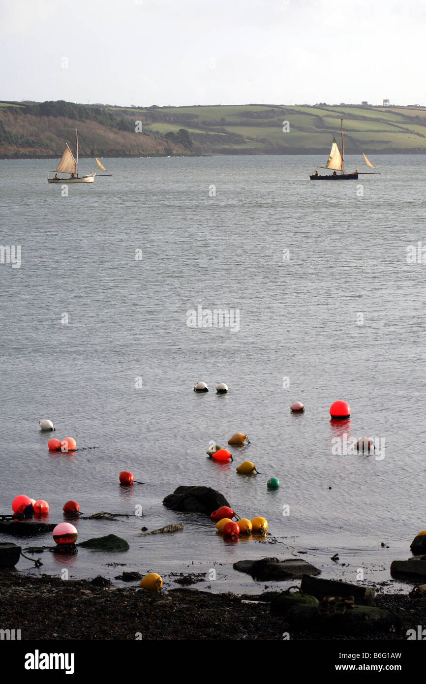Oyster fishermen off Loe Beach Carrick Roads Feock Cornwall in Winter ...